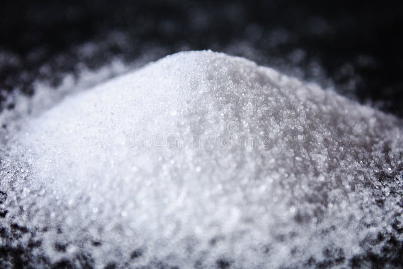 Slides of Small Crystals of Salt are Scattered on a Black Table. Stock ...