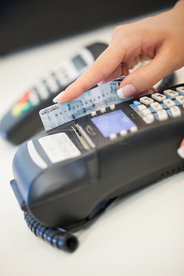 Sliding the Credit Card through the Reader Stock Image - Image of ...