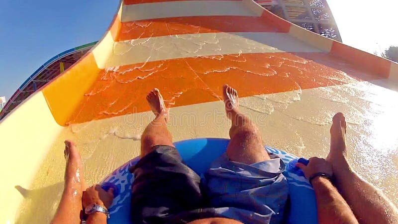 Sliding Down on Water Slide in Aqua Park Stock Footage - Video of ...