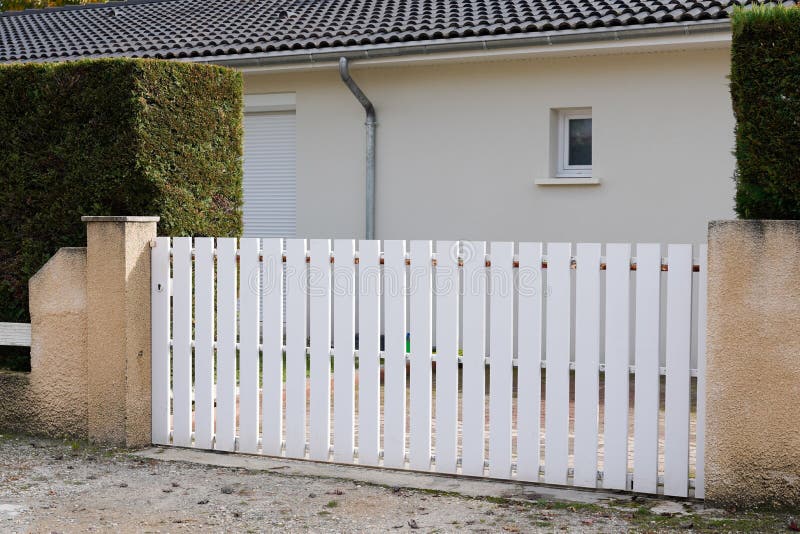 Sliding Gate Suburb White House Gate with Slats Stock Photo - Image of ...