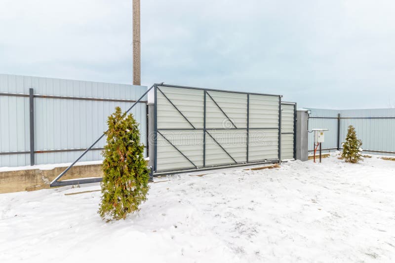 Sliding Metal Gate with Automatic Opening, Winter, Snow Stock Image ...