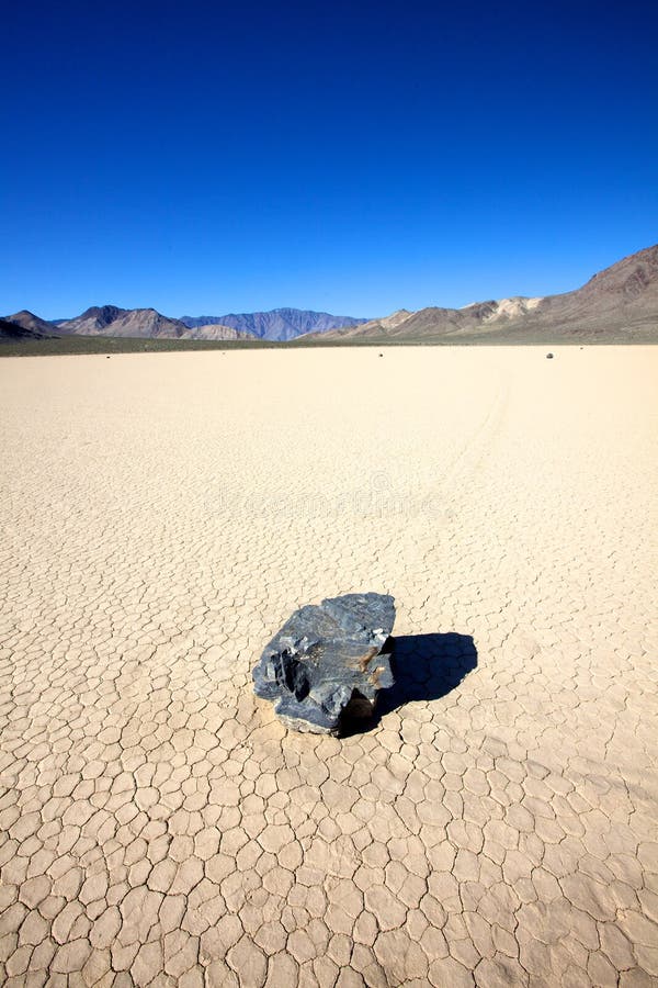 Sliding Rock on Dry Lake Bed Stock Photo - Image of flat, cracks: 14275978