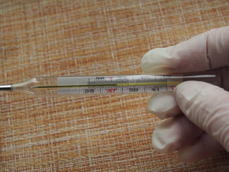 A Slight Increase in Temperature on the Thermometer. 37.5 Degrees ...