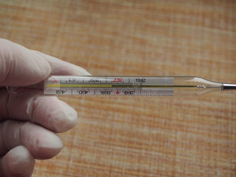 A Slight Increase in Temperature on the Thermometer. 37.5 Degrees ...