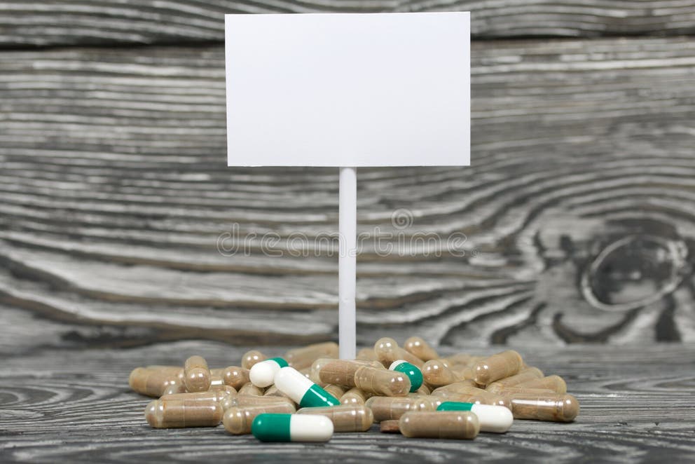 Slightly Different Pills on Pine Boards Painted in Black and White ...
