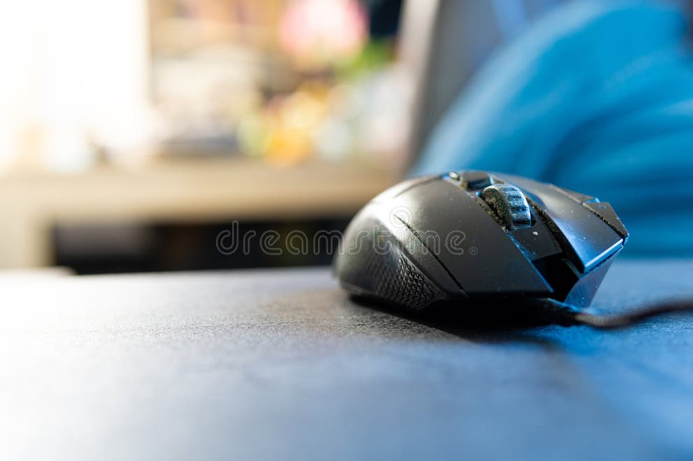A Slightly Dirty Computer Mouse on a Desk Background Stock Image ...