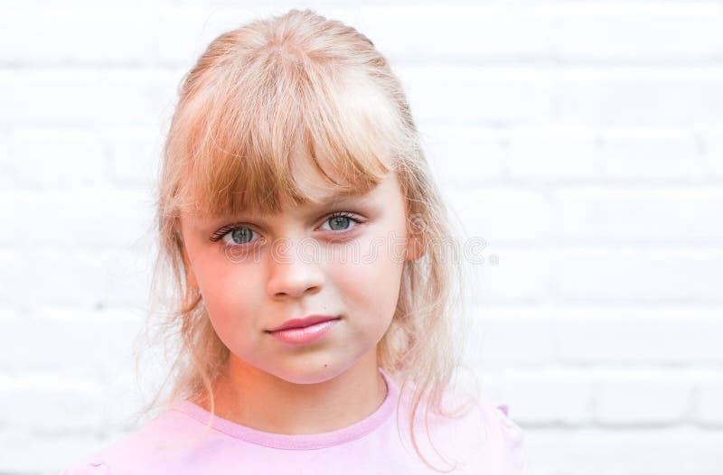 Beautiful Slightly Smiling Little Blond Girl Stock Photos - Free ...