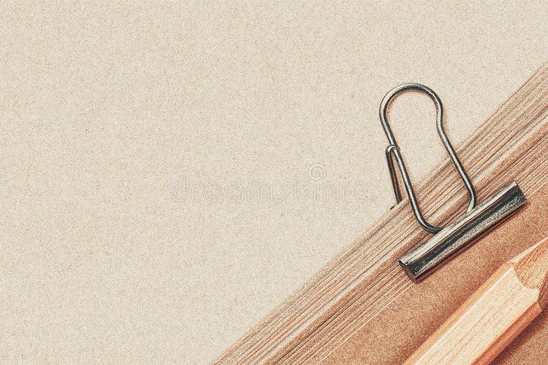 Slim Stack of Textured Paper Held Together by a Binder Clip with a ...