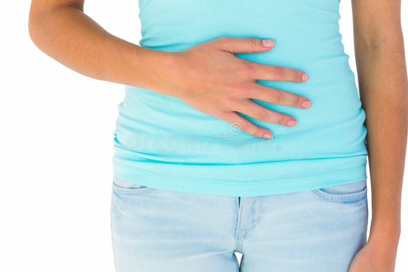 Slim Woman with Hand on Stomach Stock Image - Image of white, studio ...