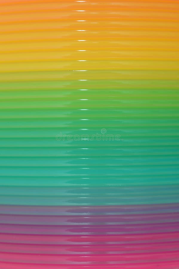 Stretching Slinky Toy in the Shape of Parabola. Editorial Photo - Image ...
