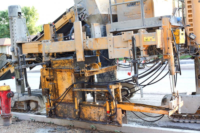 Slipform paving machine stock image. Image of machine - 99647979