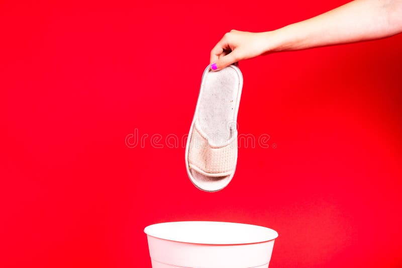 The Slipper is Thrown into the Trash for Disposal and Recycling Stock ... The Slipper is Thrown into the Trash for Disposal and Recycling Stock ...