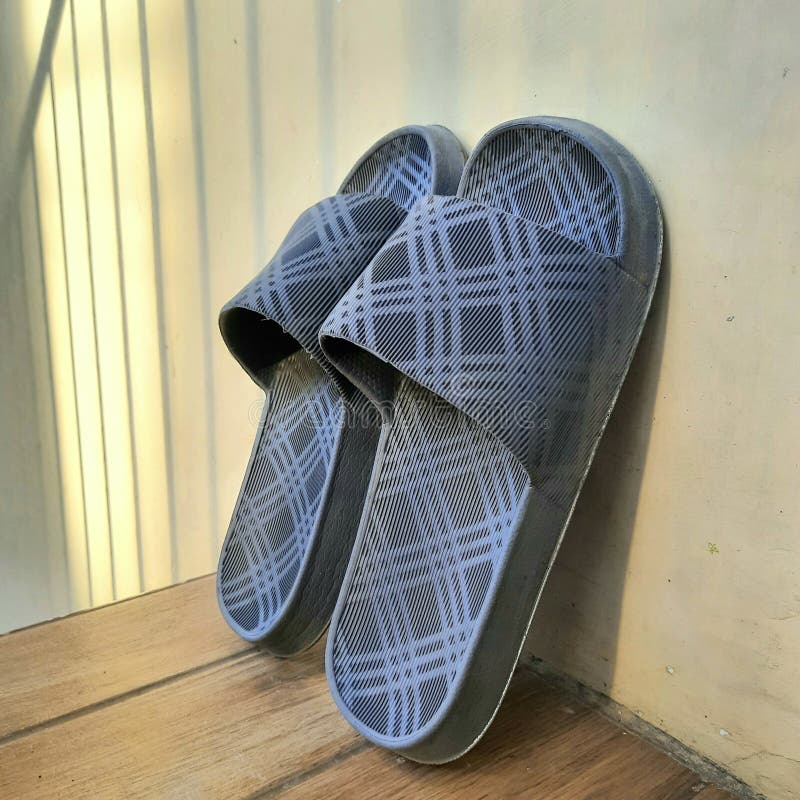 The Slippers Lean Back on Side Wall Stock Image - Image of slippers ...