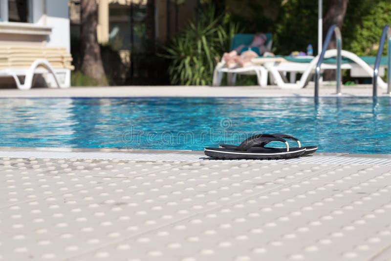 309 Slippers Near Swimming Pool Stock Photos - Free & Royalty-Free ...