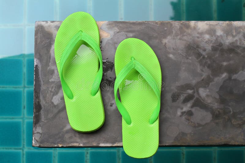 Slippers on the pool. stock photo. Image of blue, holiday - 21345418