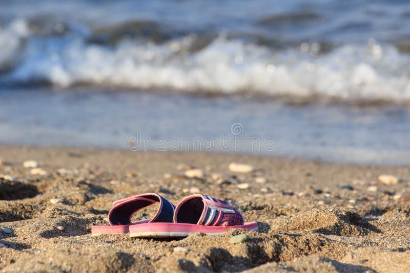 Slippers on Sand Beach Near the Water Stock Photo - Image of summer ...