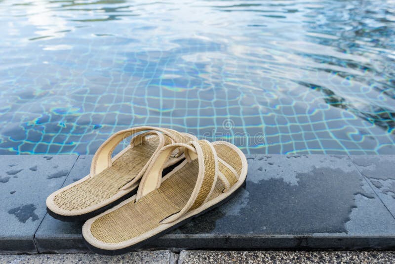 Slippers beside Swimming Pool Stock Photo - Image of footwear, bamboo ...