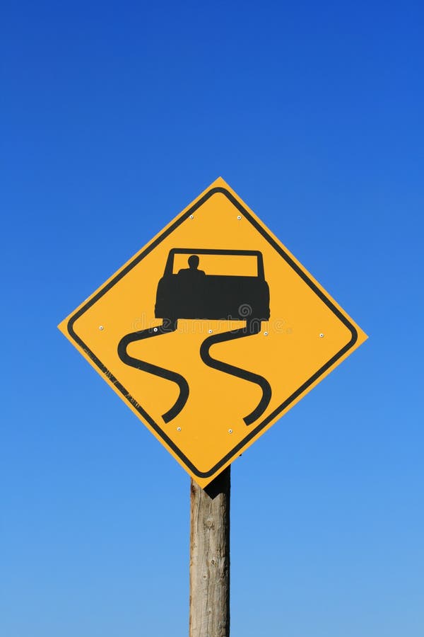 Slippery road sign stock photo. Image of skid, slide - 17915220