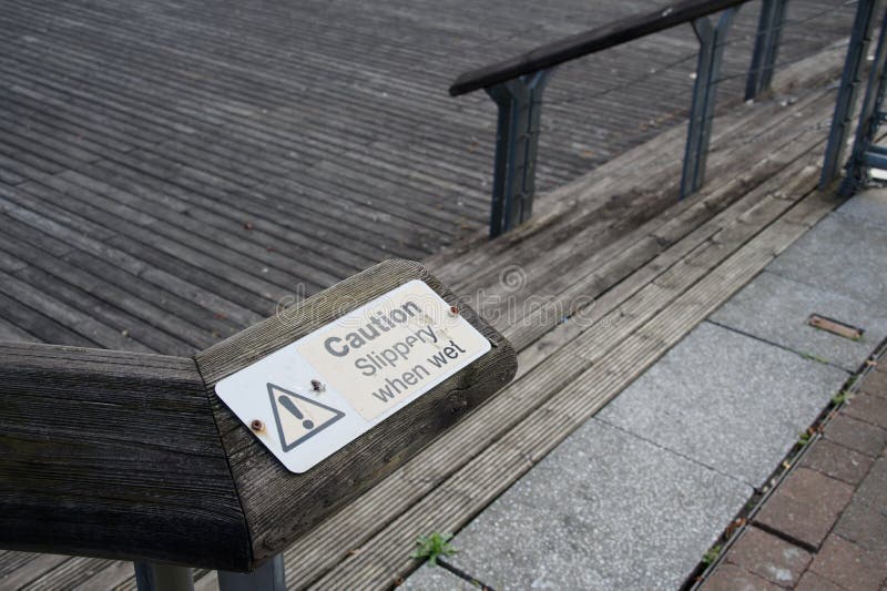 Slippery when Wet Warning Sign at Steps Stock Image - Image of rain ...