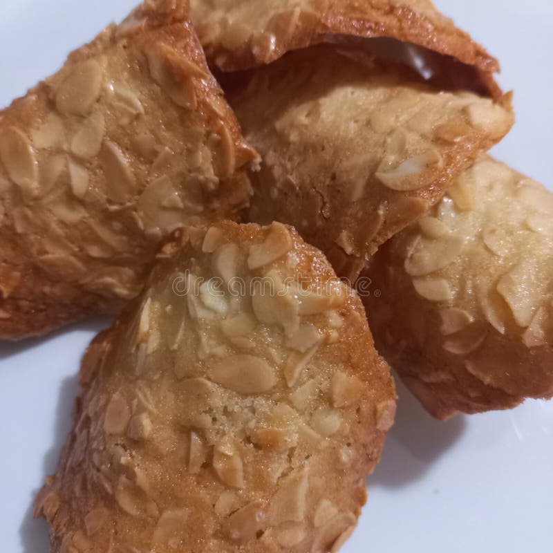 Slivered almond tiles stock photo. Image of fruit, baking - 254964830