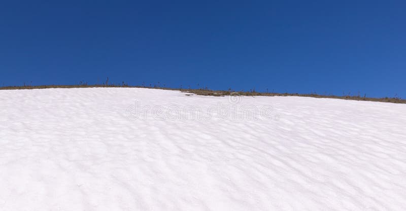 Smooth Snow and Blue Sky in the Mountains Stock Photo - Image of calm ...