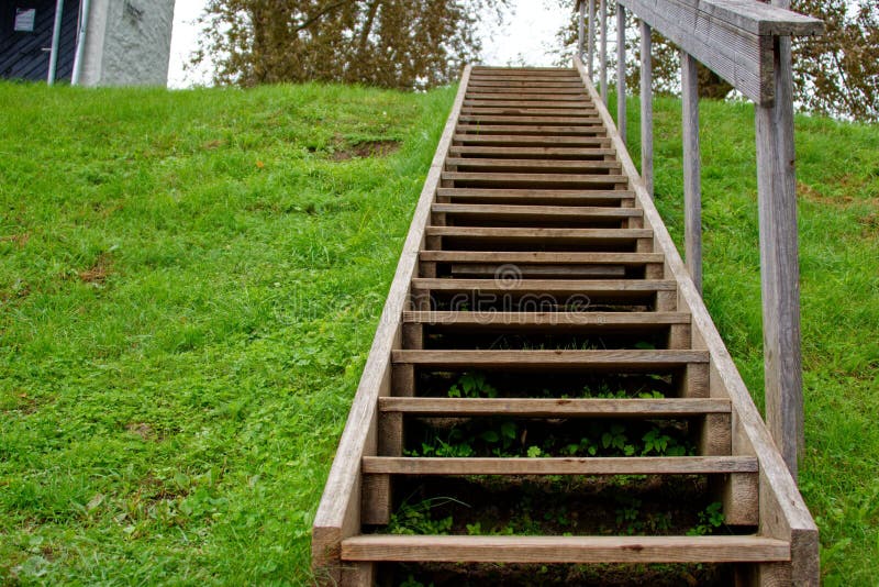 Slope of a Hill with Wooden Ascending Stairs Stock Photo - Image of ...