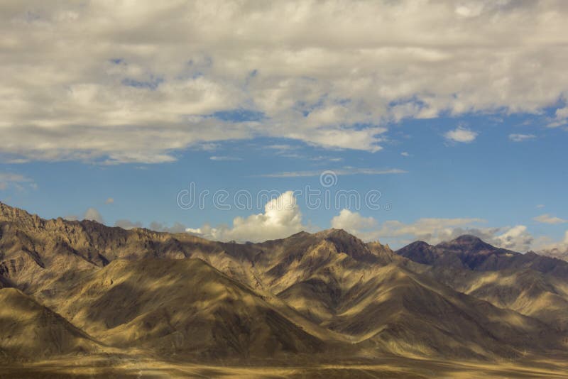 Slopes of Desert Mountains Under the Clouds in the Afternoon Stock ...