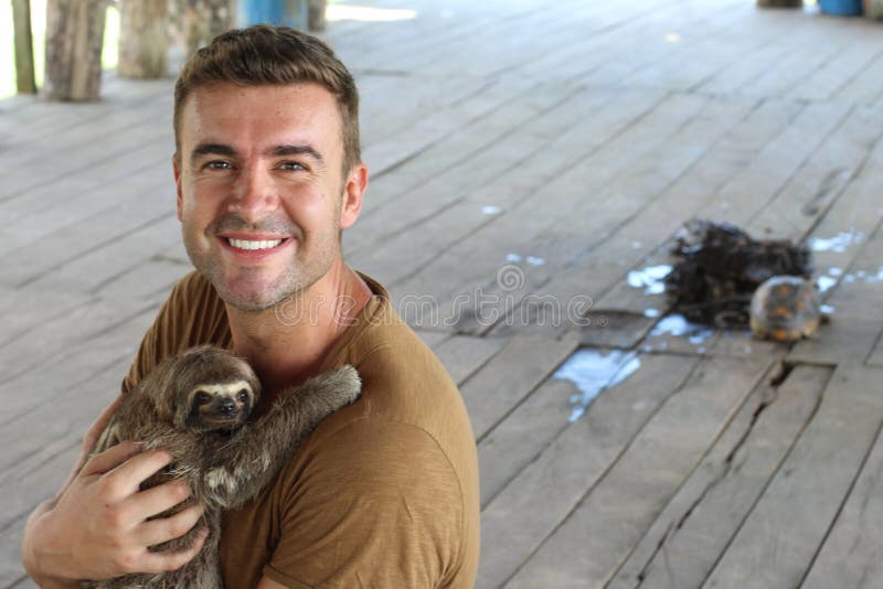 Sloth Hugging a Handsome Man Stock Image - Image of central, happy ...