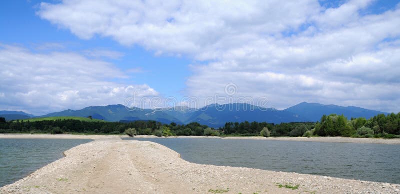 Slovakia Lake with Blue Water and Sand Beach, White Clouds on Blue Sky ...