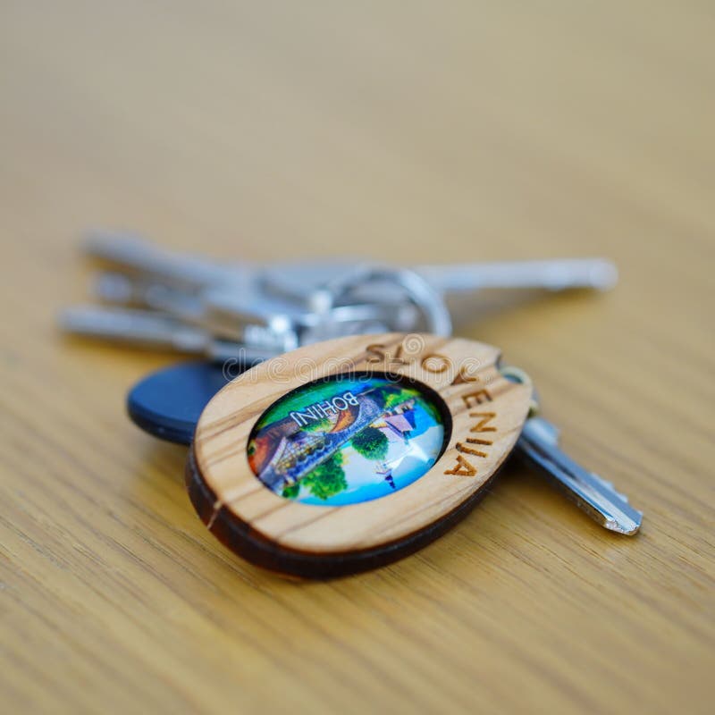 Slovenia Wooden Souvenir Key Chain on a Wooden Surface Editorial Stock ...