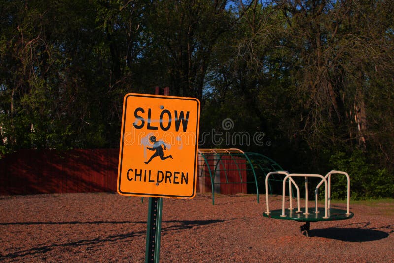 Slow Children Safety Sign in a Park Stock Photo - Image of road, beware ...