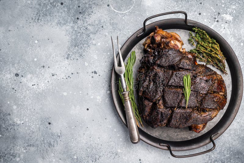 Slow Cooked Venison Roast Leg. Braised Game Meat of Deer with Bone ...