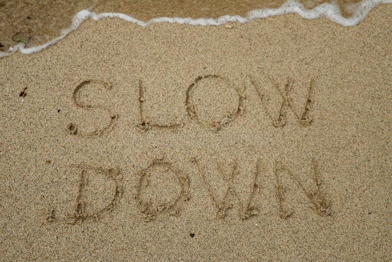 Slow Down, Mindfulness Concept Written on Sand Stock Image - Image of ...
