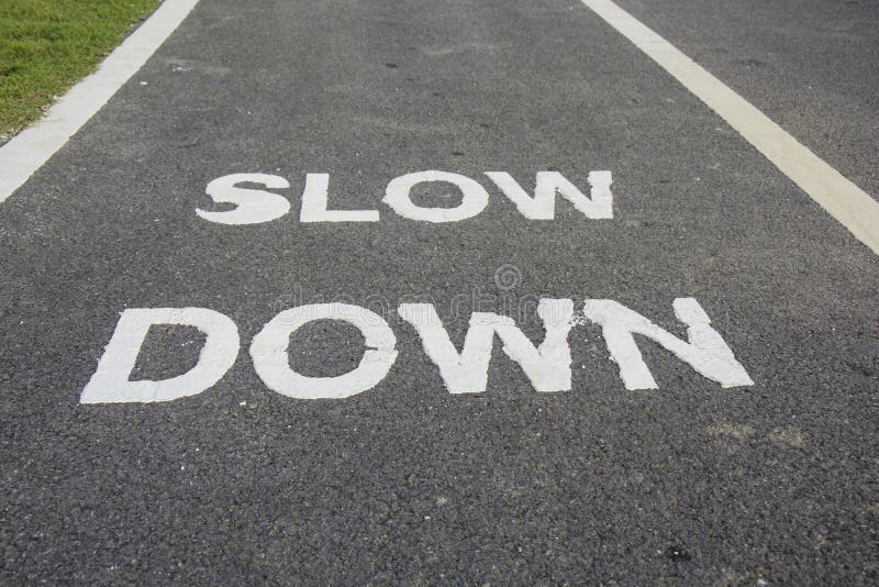 SLOW DOWN Painted on the Bike Lane Stock Image - Image of caution ... SLOW DOWN Painted on the Bike Lane Stock Image - Image of caution ...