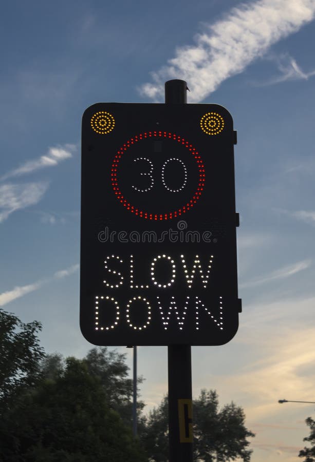 Slow down sign stock photo. Image of urban, scene, number - 32666306