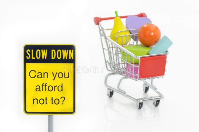 Slow Down Traffic Sign and Shopping Cart Stock Photo - Image of excess ...