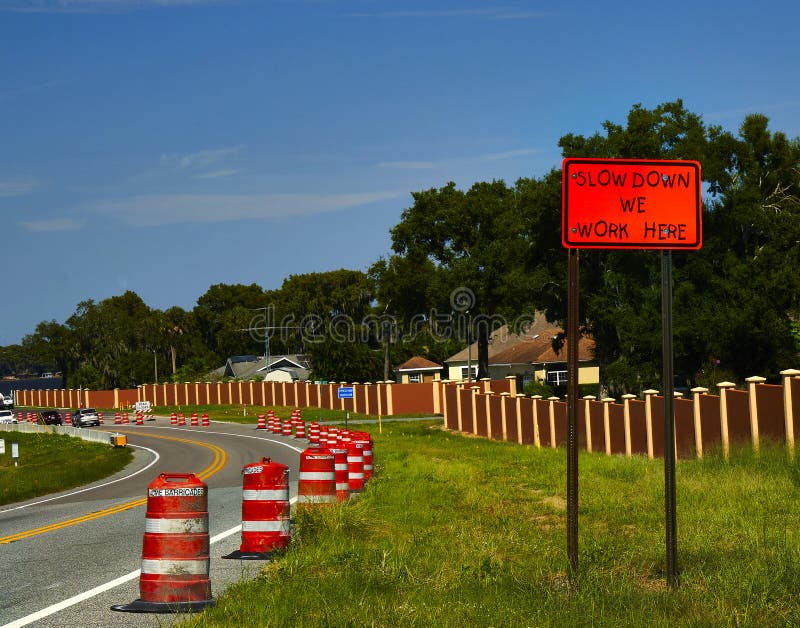 Slow Down Sign Construction Ahead Editorial Photography - Image of lane ...