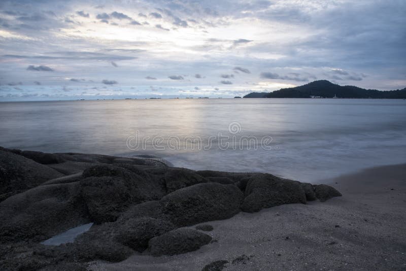 Slow Exposure Shots of the Sea Waves Along the Rocky Beach. Stock Image ...