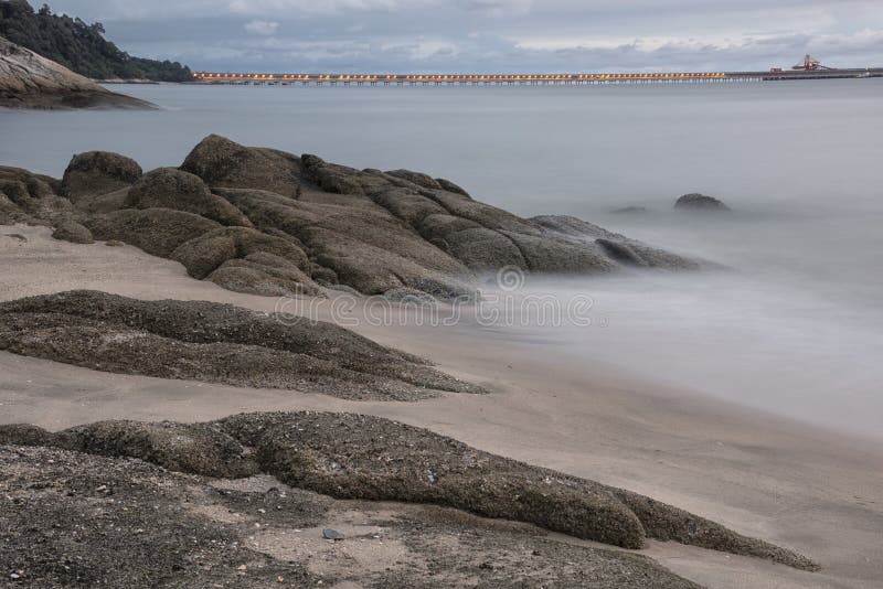 Slow Exposure Shots of the Sea Waves Along the Rocky Beach. Stock Image ...