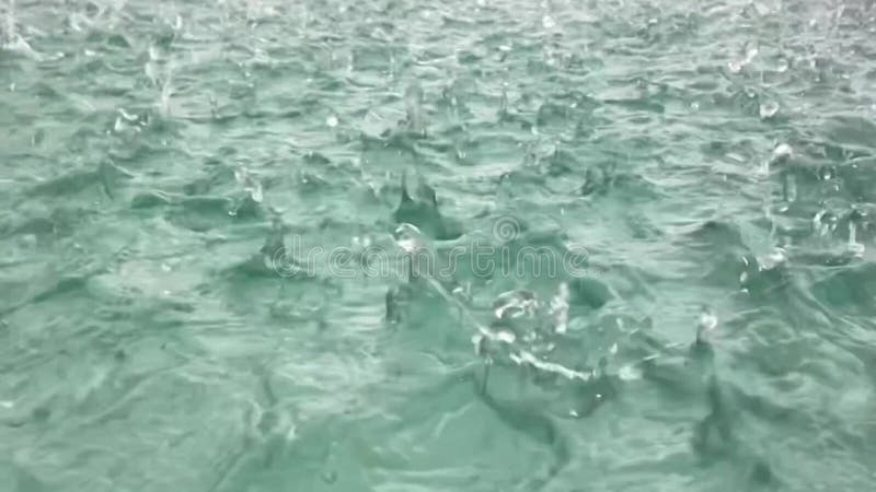 Slow Fall of Raindrops To the Surface of the Water. Soft Focus Stock ...