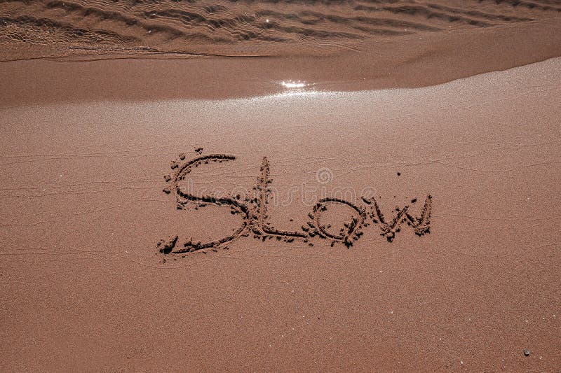 Slow Mindfulness Concept Written on Sand Stock Photo - Image of slow ...