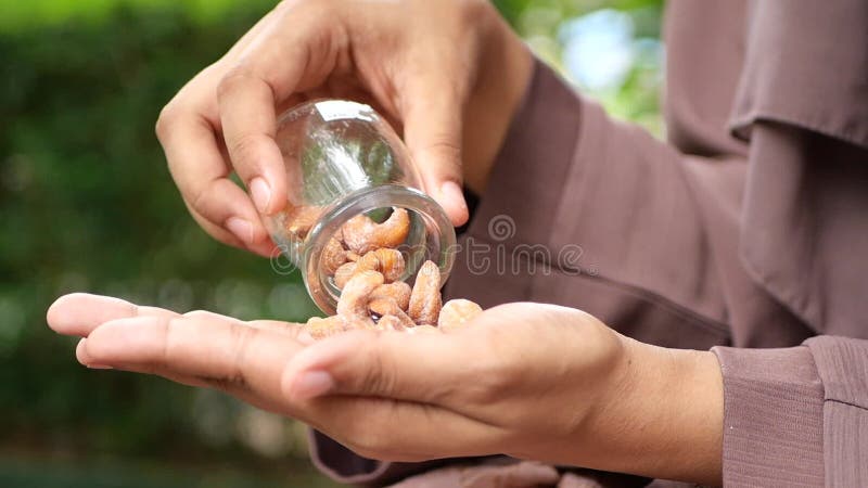 Slow Motion of Almond Nuts Pouring on Hand Stock Video - Video of snack ...