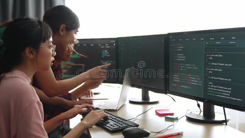 Slow Motion Back End Software Developer Engineer Writing Code. Burgeoning Stock Video - Video of ...