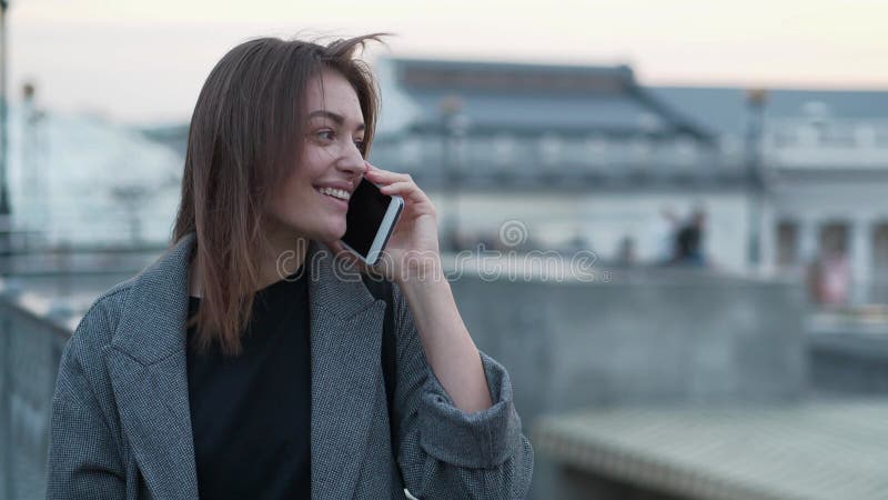 Slow Motion Beautiful Woman Talks on Smartphone Stock Footage - Video ...