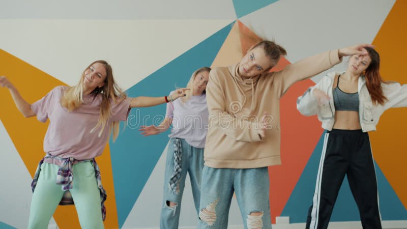 Slow Motion of Beautiful Young Ladies Dancing in Dance Studio Learning ...