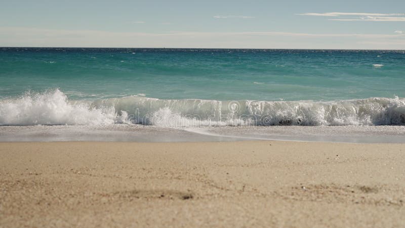 Slow Motion Blue Waves on a Sandy Empty Beach in Cannes in Spring Stock ...