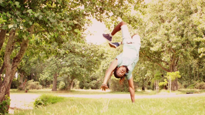 In Slow Motion Cool Young Break Dancer Doing Back Flip in the Park ...
