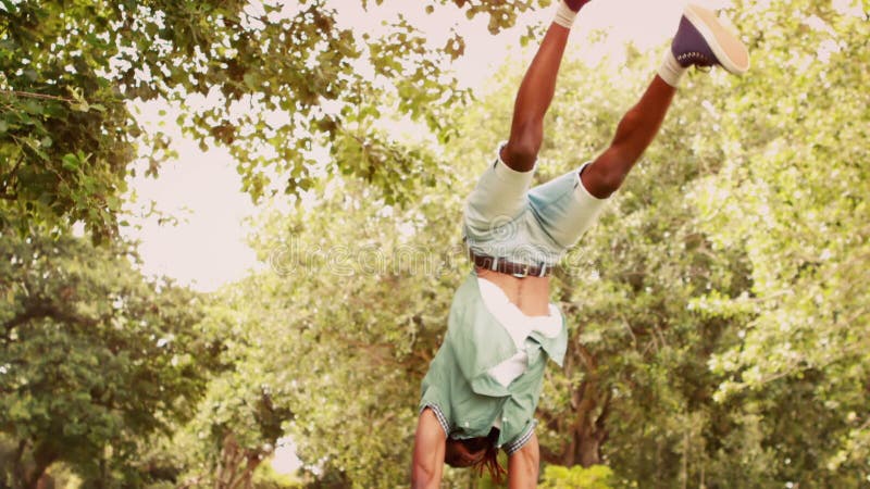 In Slow Motion Cool Young Break Dancer Doing Back Flip in the Park ...
