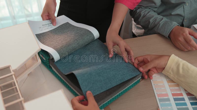 Slow Motion Designer and Client Choosing Material for Home. Variegated ...