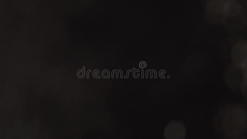 Slow Motion, Different Sized Pieces of Dust Falling from Above. Stock ...